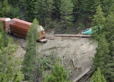 Derailment cleared from MRL tracks; fuselages still in river
