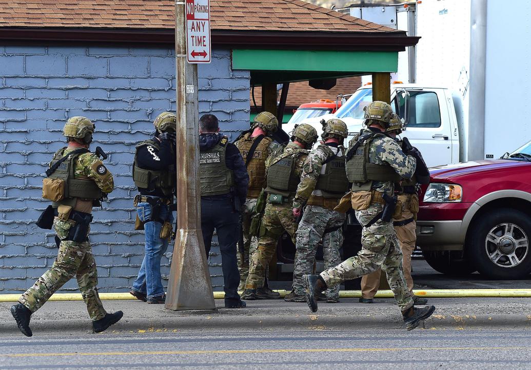 SWAT team surrounds Lazy KT motel in Billings