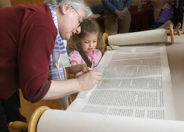 Jewish scribe gives lesson in Torah care