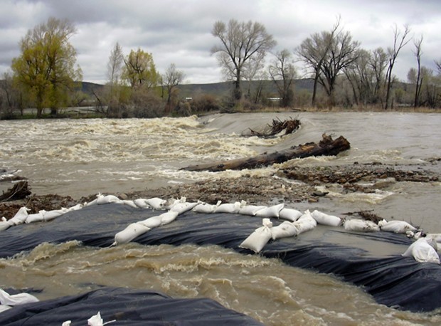 Storm slows Wyoming flood threat, but adds to snow