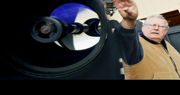 Amateur astronomer watches the skies