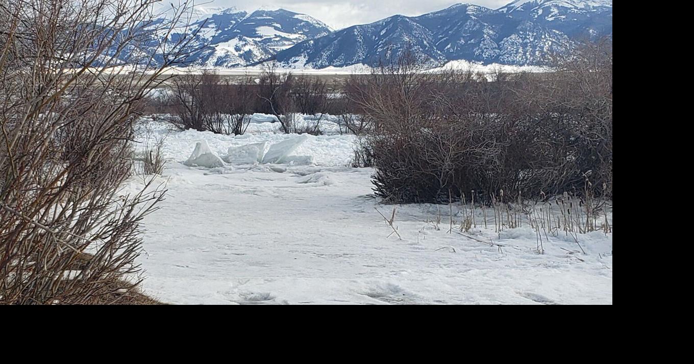 Ice buildup from sub-zero weather jams rivers, streams
