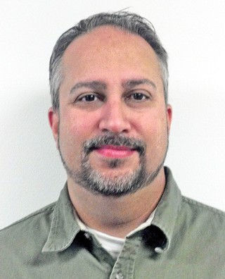 Wold honored with Extra Mile Award