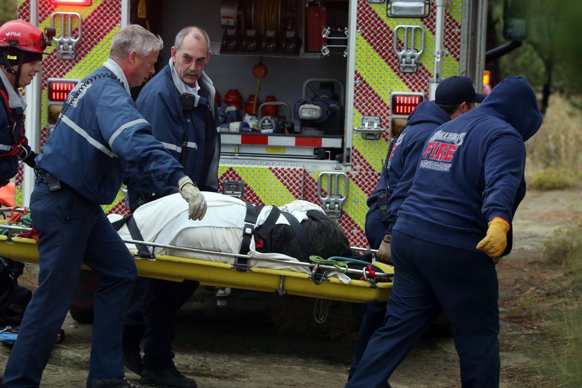 Firefighters rescue woman who fell from Rims