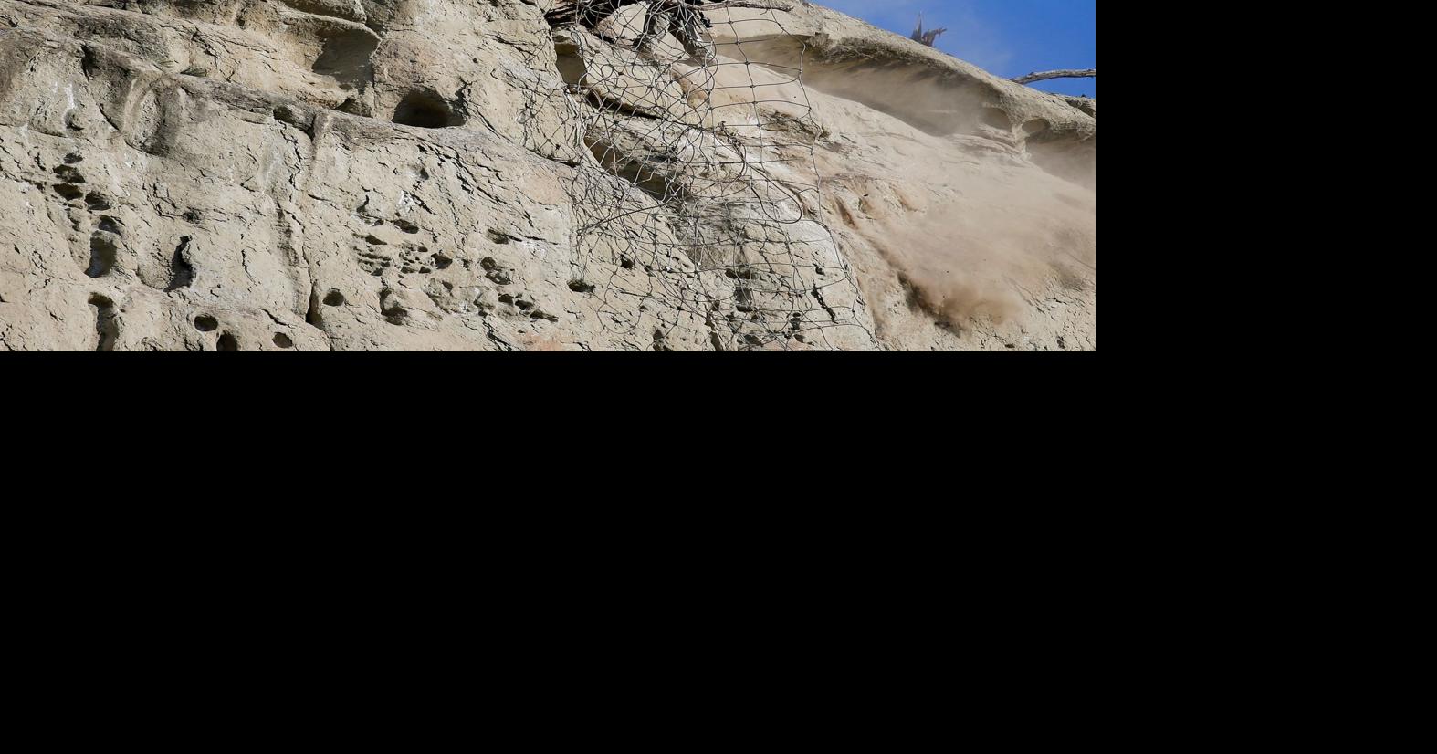Crews work to bring down Rimrocks on West End