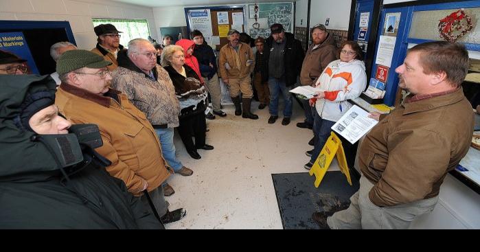 Walsh signs onto plan to save postal sevices