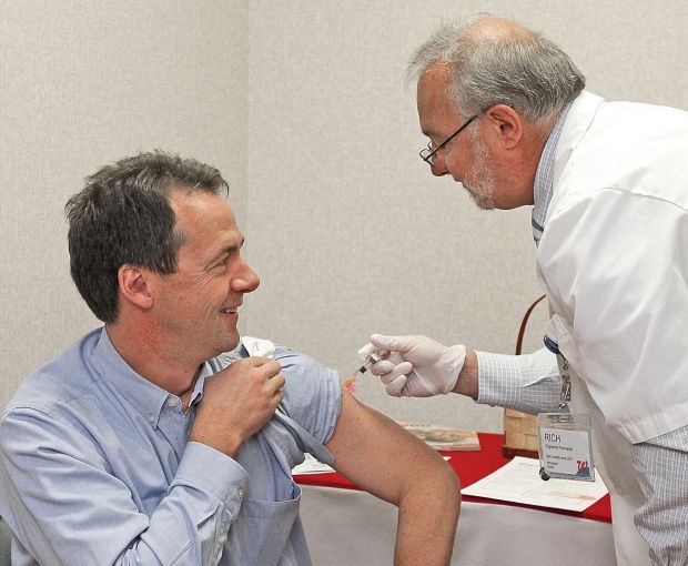 News photo: Governor gets his flu shot