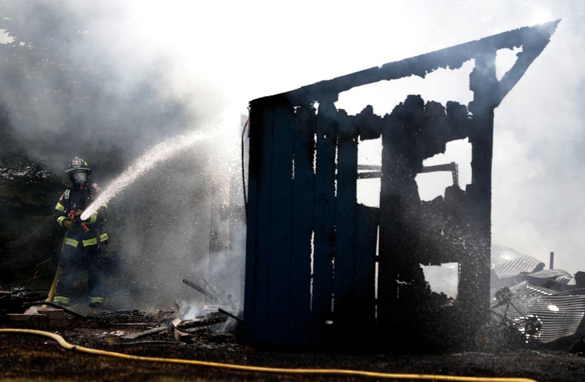Meat smoker fire destroys Heights barn