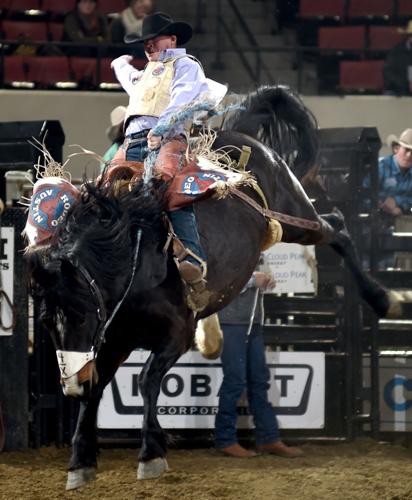 Cody Wright, late replacement, wins Chase Hawks saddle bronc title