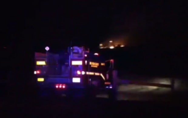 Structure fire burns on land north of Pryor
