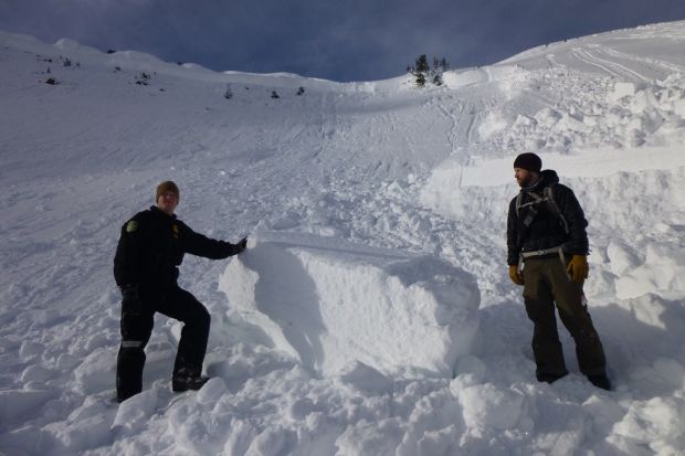 Snowmobiler survives being buried by massive avalanche
