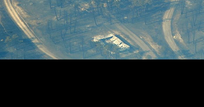An aerial view shows the expanding Dahl fire