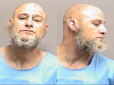 Man accused of arson and trying to ram police in standoff