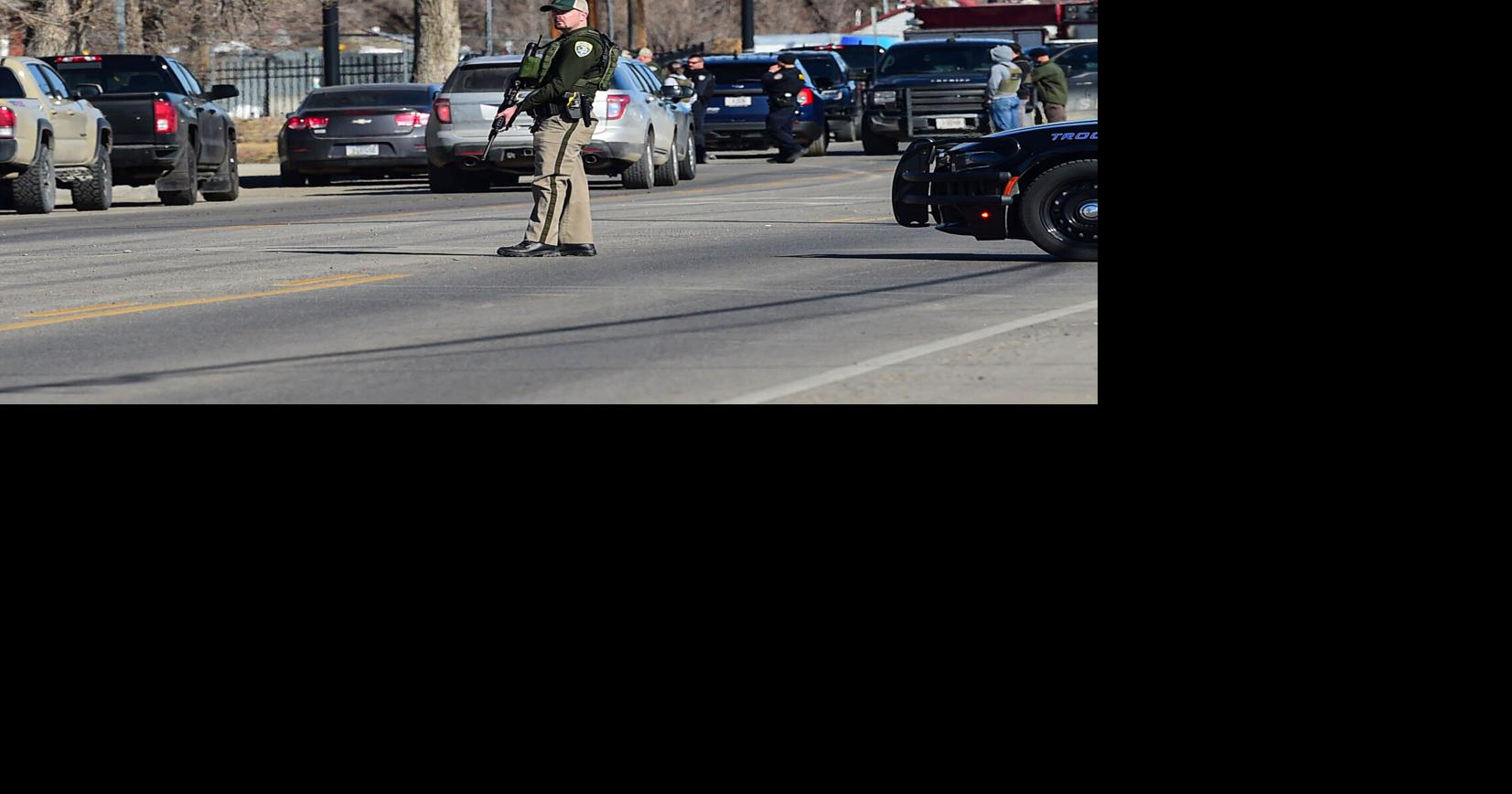 Standoff in the heights continues, officer shot