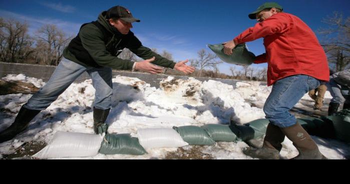 Residents scramble to safety after ice jam sends water rushing