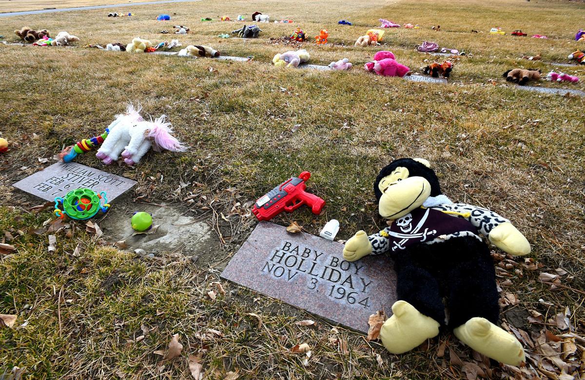 Photo: Toys decorate children's graves