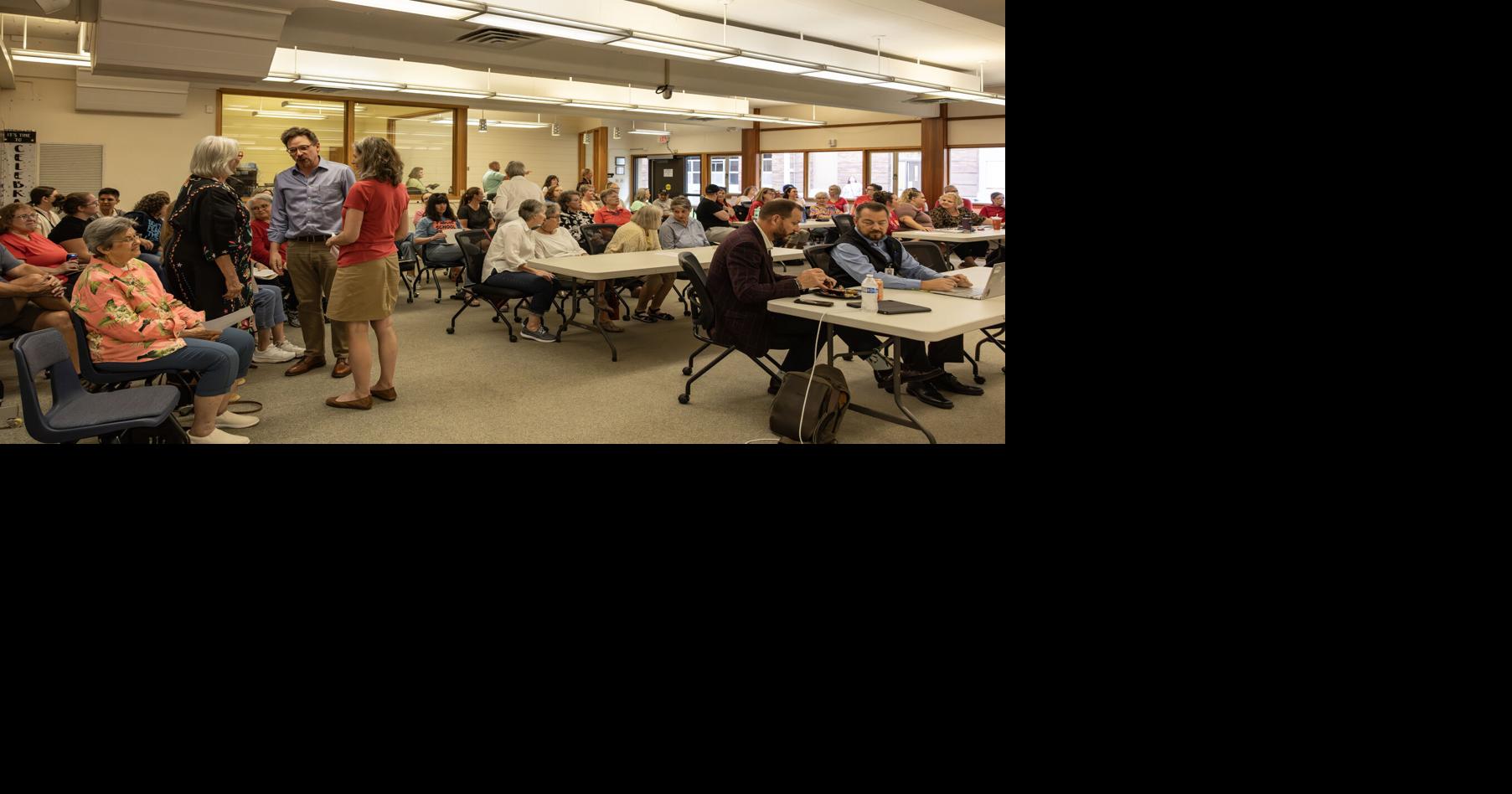 School board votes on book policy to comply with state law