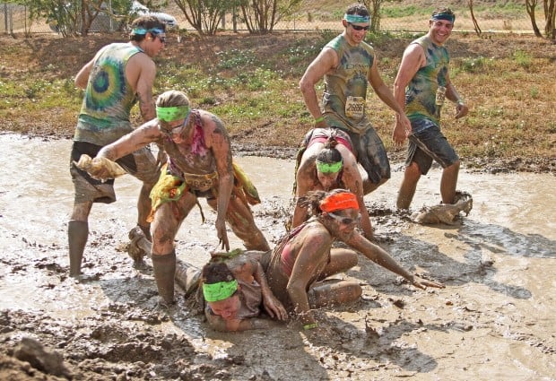 Thousands get down and dirty in muddy Dirty Dash
