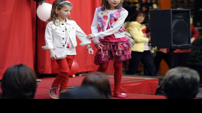 Lynsey Hope coaxes her little sister Cecily down the runway | Local ...