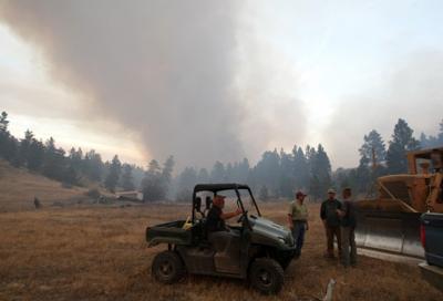 Wilson fire 100 percent contained
