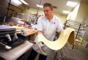 Doughnut maker still doing it old-fashioned way