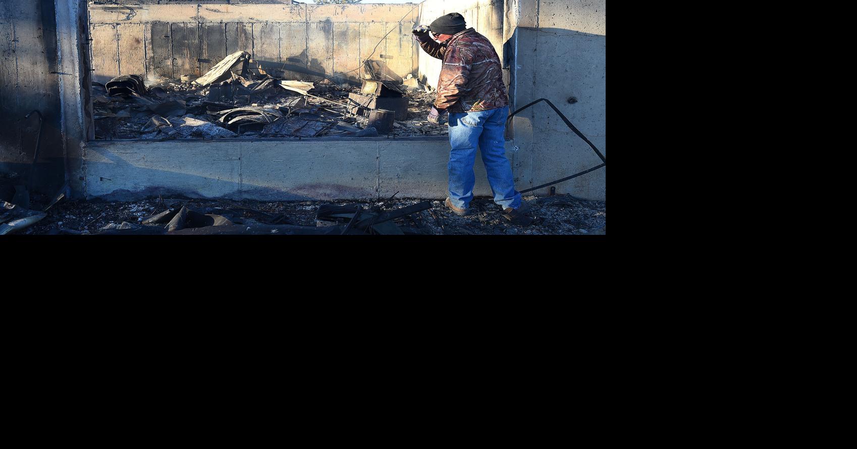 Photos: Wind-driven fire burns homes near Roundup