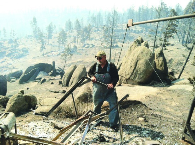 Man defies orders, saves home he built from 19 Mile Fire
