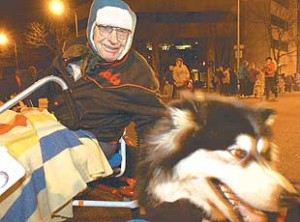 Cowboy in parade with power of 'mush'