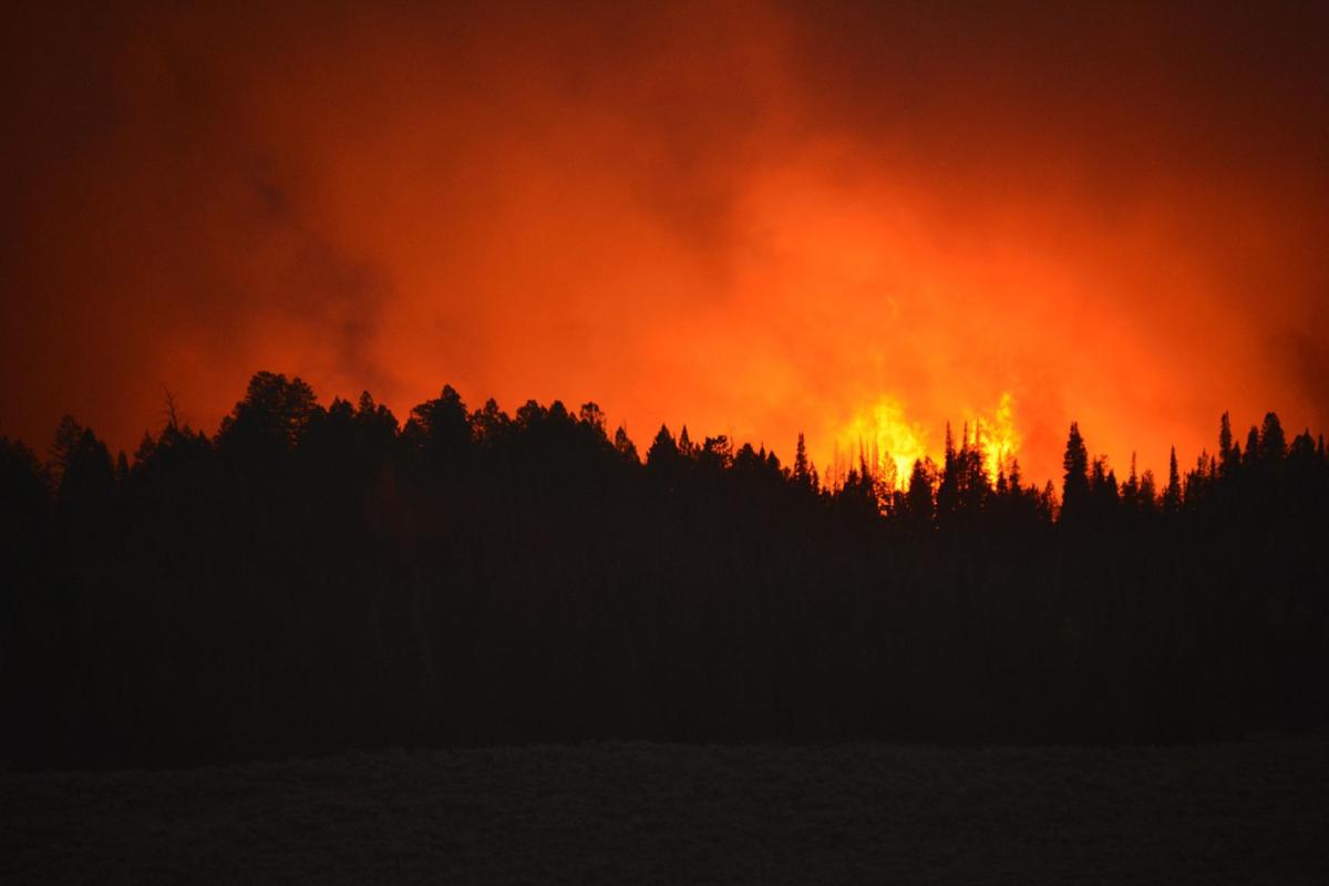 Firefighting operations close major Wyoming highway