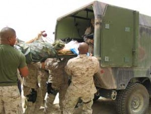 Navy surgeons help Marines in combat