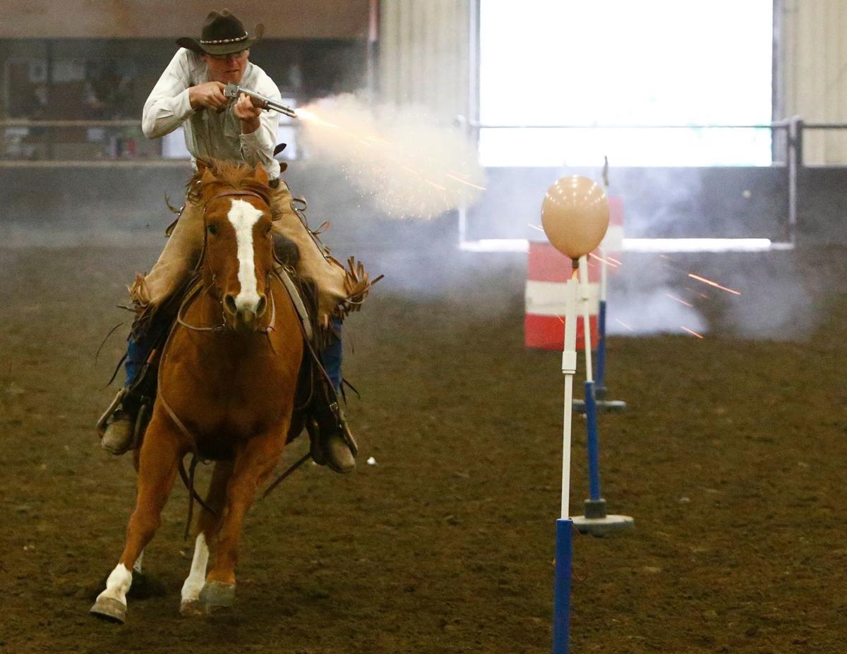 Horseback riders get hooked on cowboy mounted shooting at equestrian ...