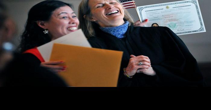 New citizens welcomed in naturalization ceremony
