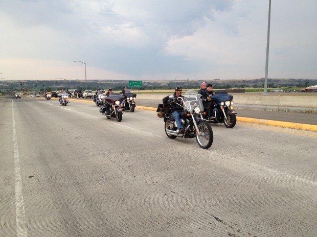 Procession under way taking remains of veterans to Fort Harrison for burial