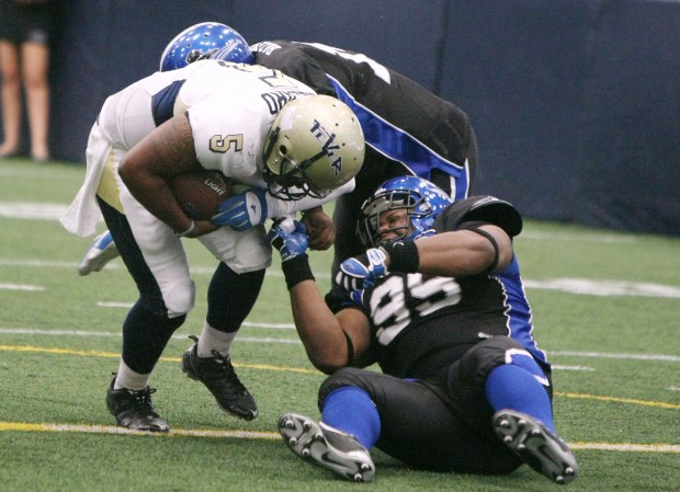 Outlaws turn back upset-minded Tri-Cities in IFL playoff opener, 54-45