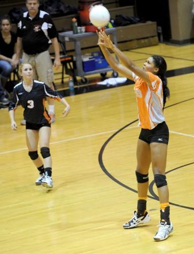 Senior's Taylor Mims sets the ball