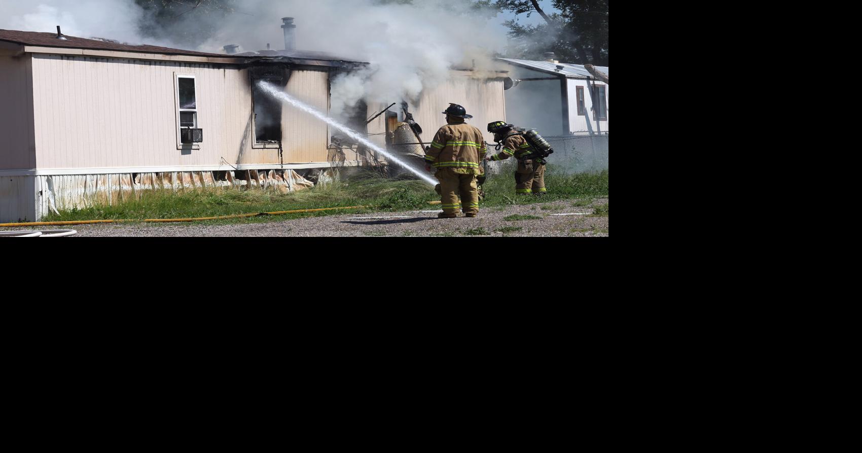 Lockwood firefighters battle mobile home fire
