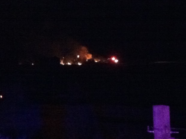 Structure fire burns on land north of Pryor