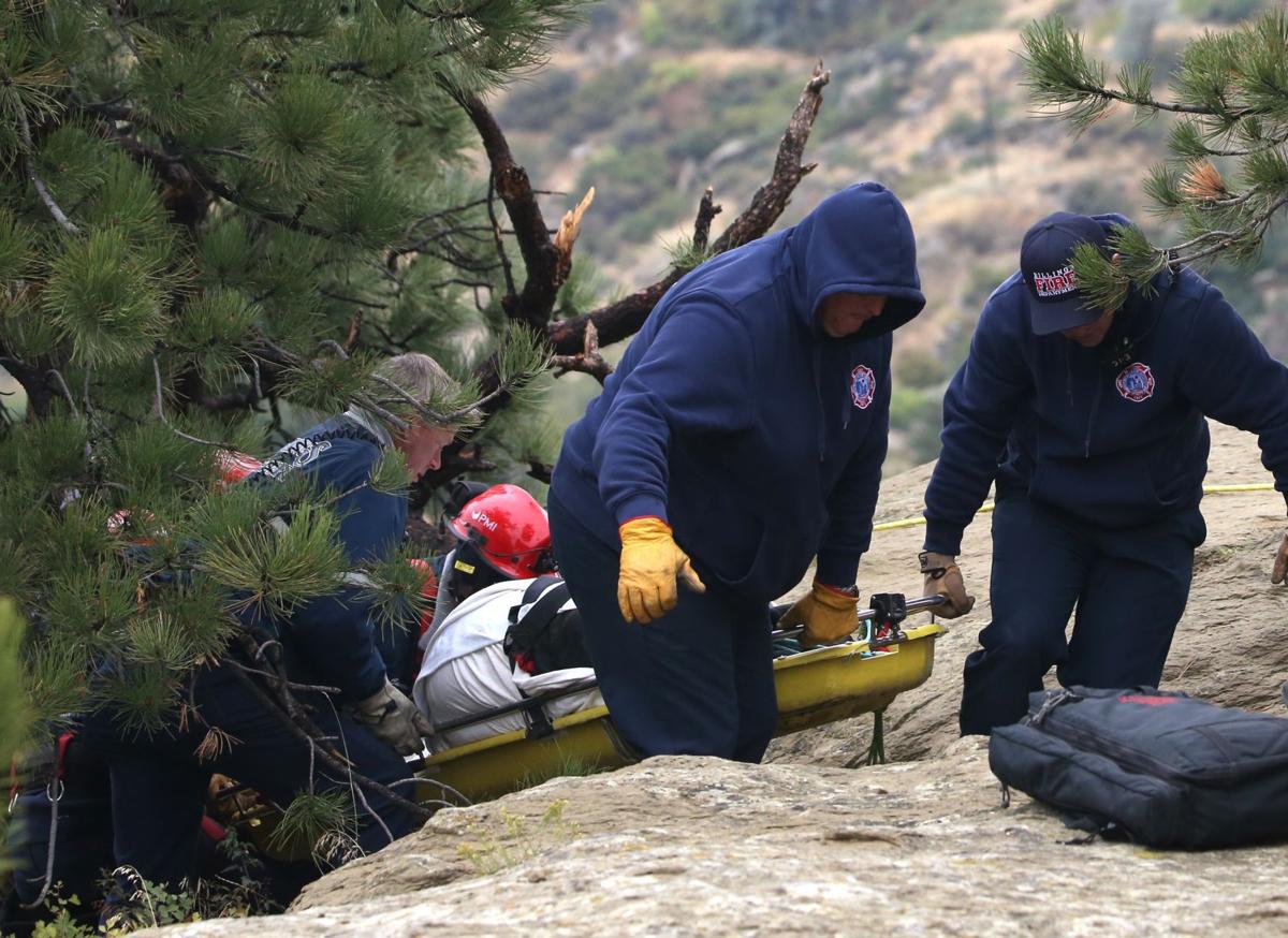 Firefighters rescue woman who fell from Rims