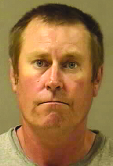 Man charged with assaulting boys in alley