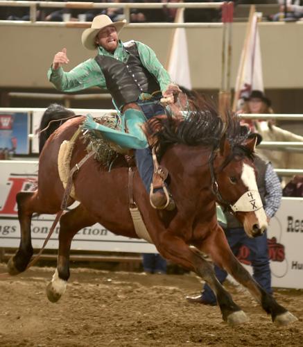 Cody Wright, late replacement, wins Chase Hawks saddle bronc title