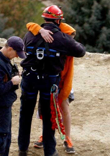 Firefighters rescue boy trapped along Rimrocks