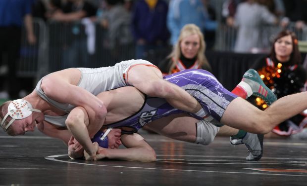 Sulser, Kramer getting college education as high school wrestling coaches