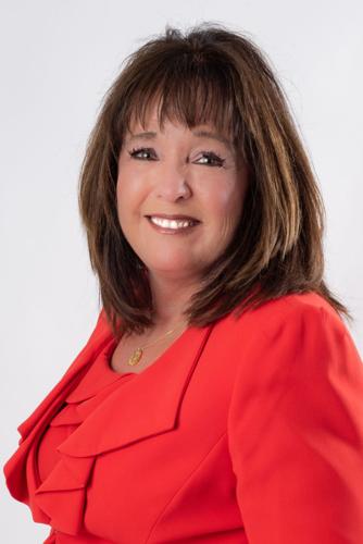 Dan And Stephanie Patterson reach real estate broker milestone