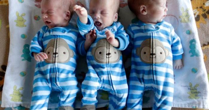 One-in-a-million family: Couple welcomes rare spontaneous identical ...