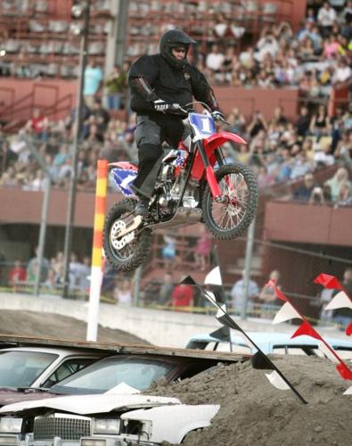Big Ed makes jump over a dozen cars, first since injury