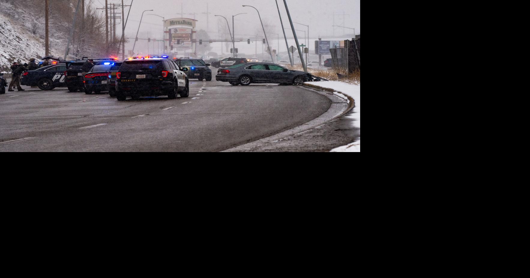 Photos: Law enforcement surround suspected armed robber during standoff ...