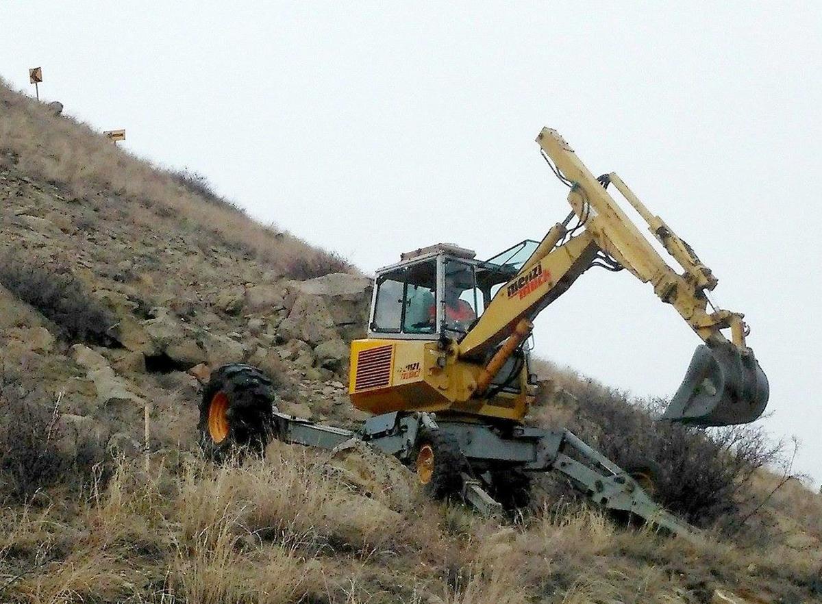 Spider excavator testing Rims' strength ahead of Zimmerman Trail work ...