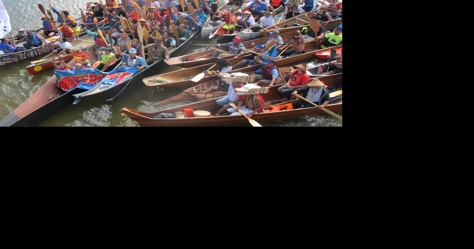 Canoe flotilla arrives at protest site