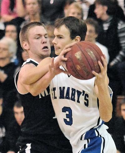 St. Mary's tops Mandan in boys basketball, Braves run past Saints in girls