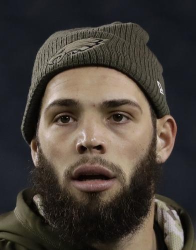 Man charged after punching Eagles' Goedert